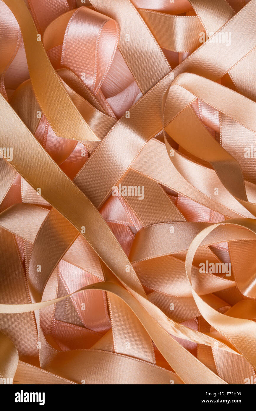 Macro of beautiful beige satin ribbon background Stock Photo - Alamy