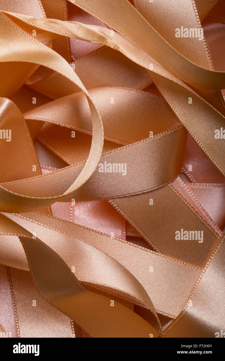 Macro of beautiful beige satin ribbon background Stock Photo - Alamy
