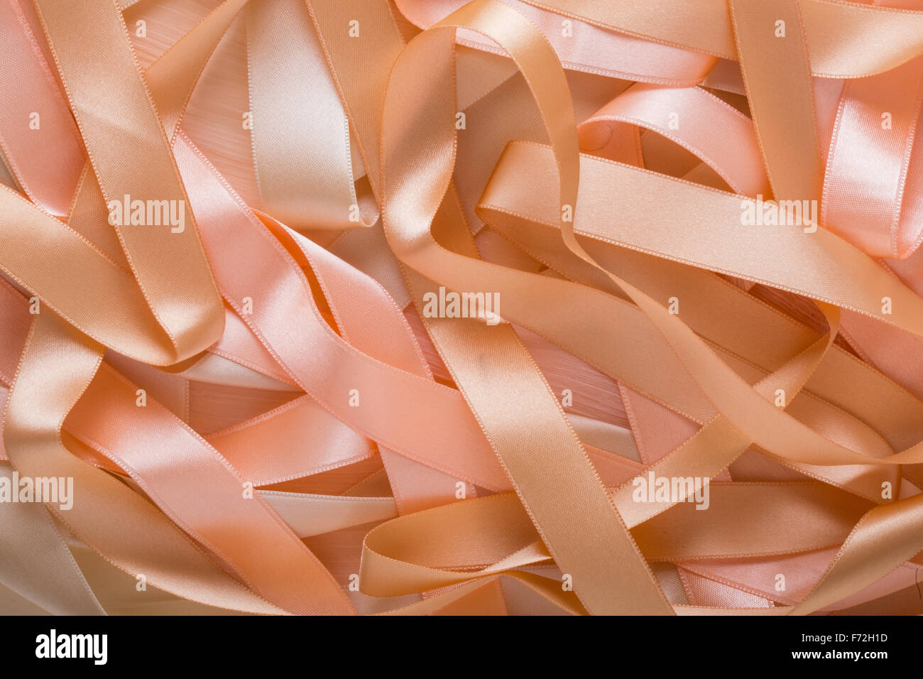 Macro of beautiful beige satin ribbon background Stock Photo - Alamy