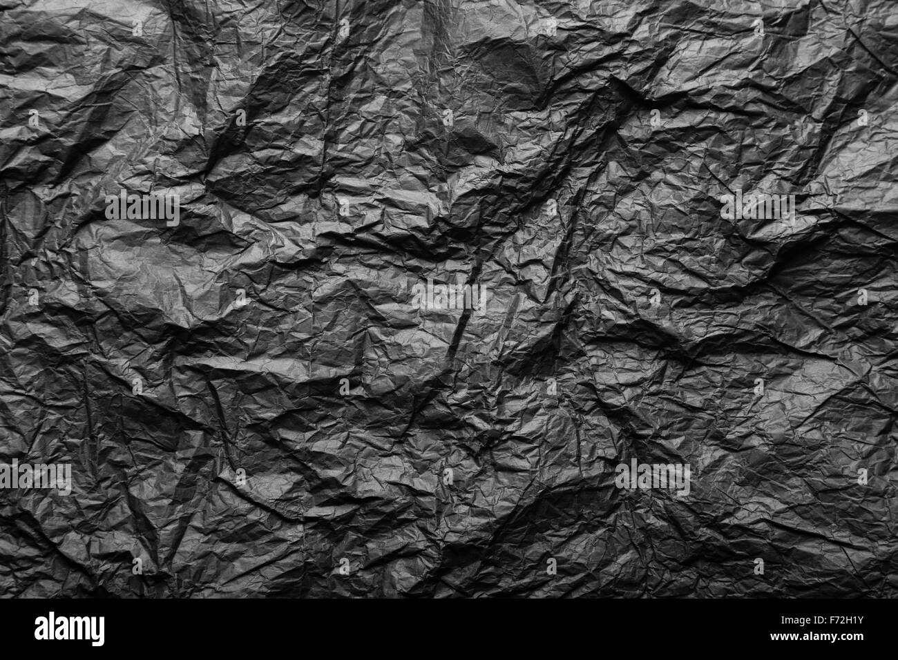 Black crumpled paper for texture and background Stock Photo - Alamy