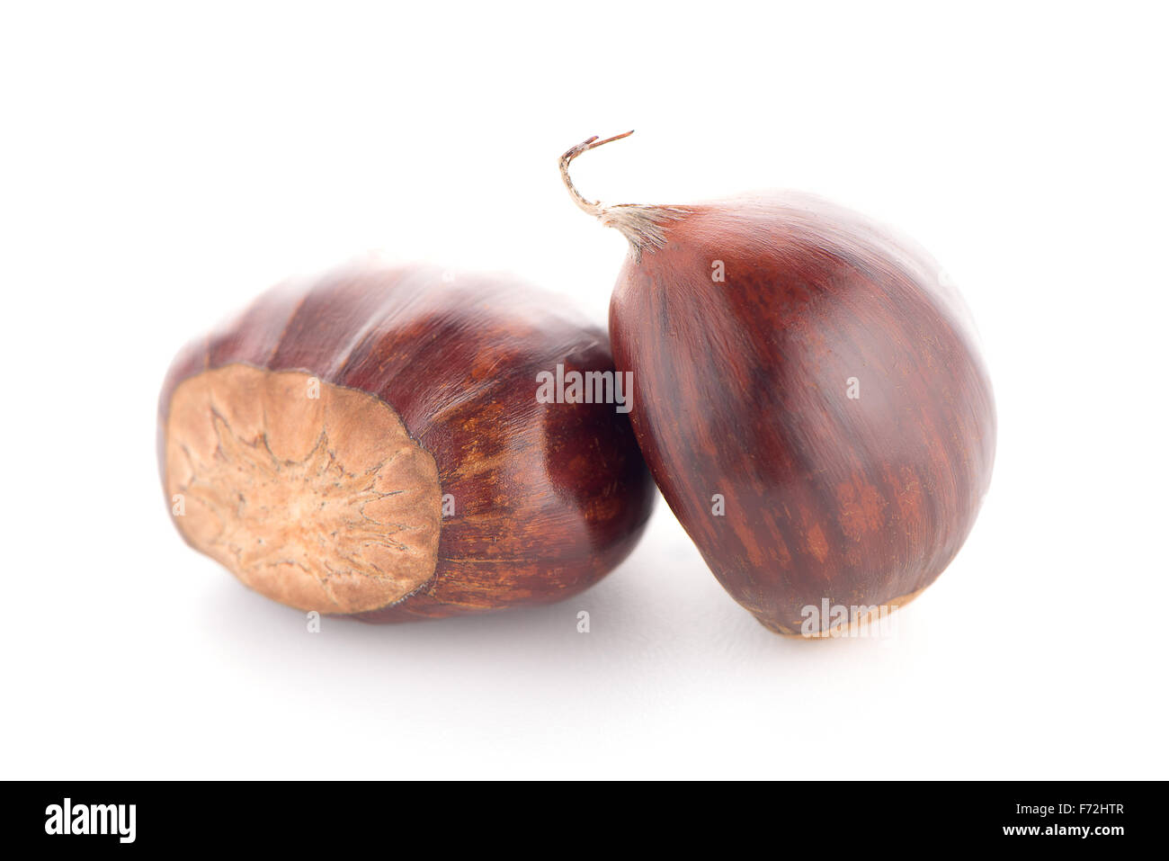 Chestnuts with shell isolated on white background Stock Photo - Alamy