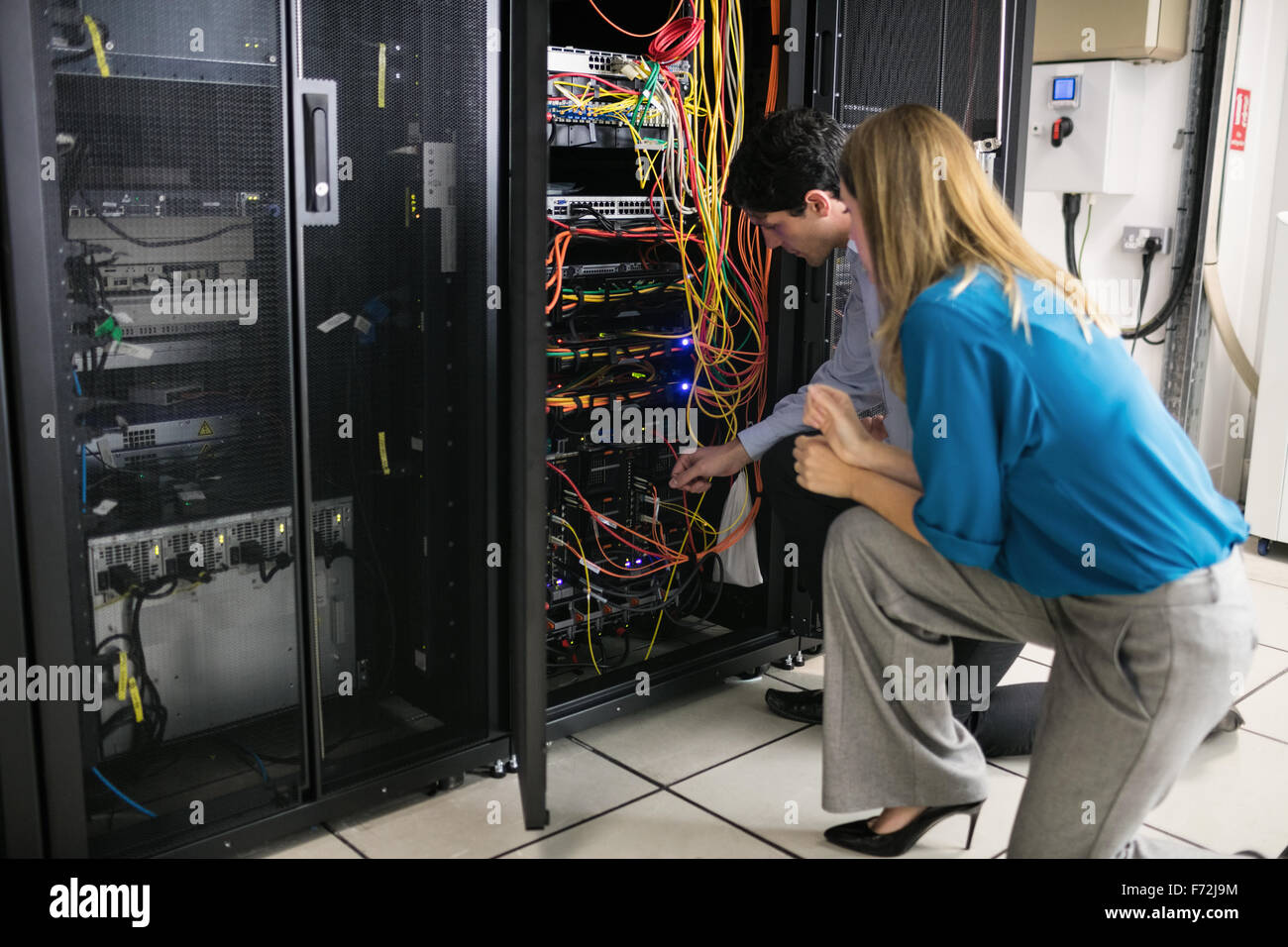 Male and female server technician hi-res stock photography and images ...