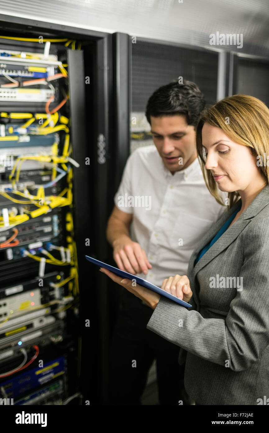 Team of technicians working together Stock Photo - Alamy