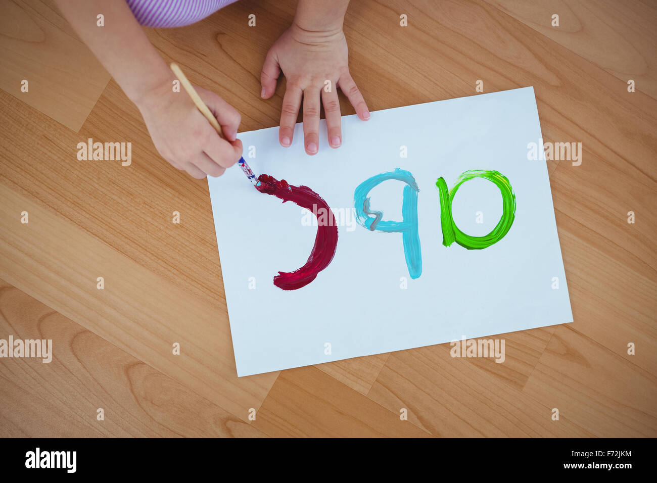Child painting letters Stock Photo - Alamy