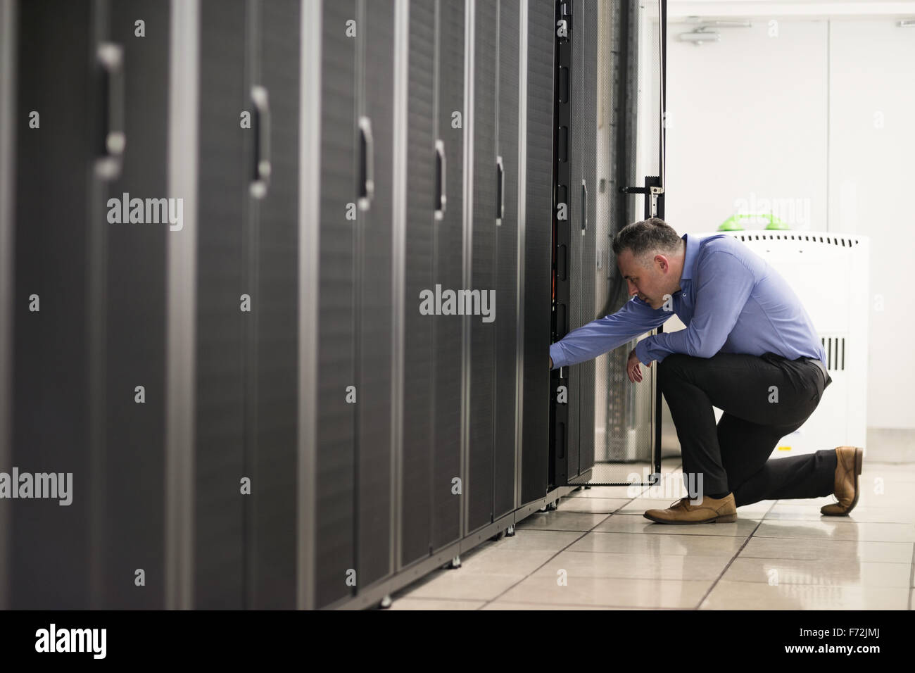Man crouching walking hi-res stock photography and images - Alamy