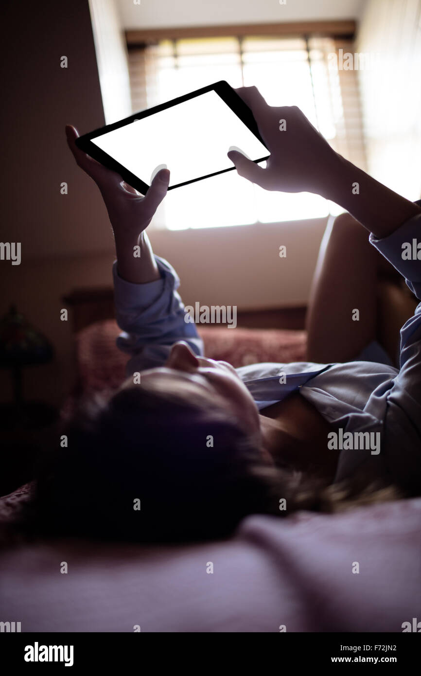 Young woman using tablet Stock Photo - Alamy