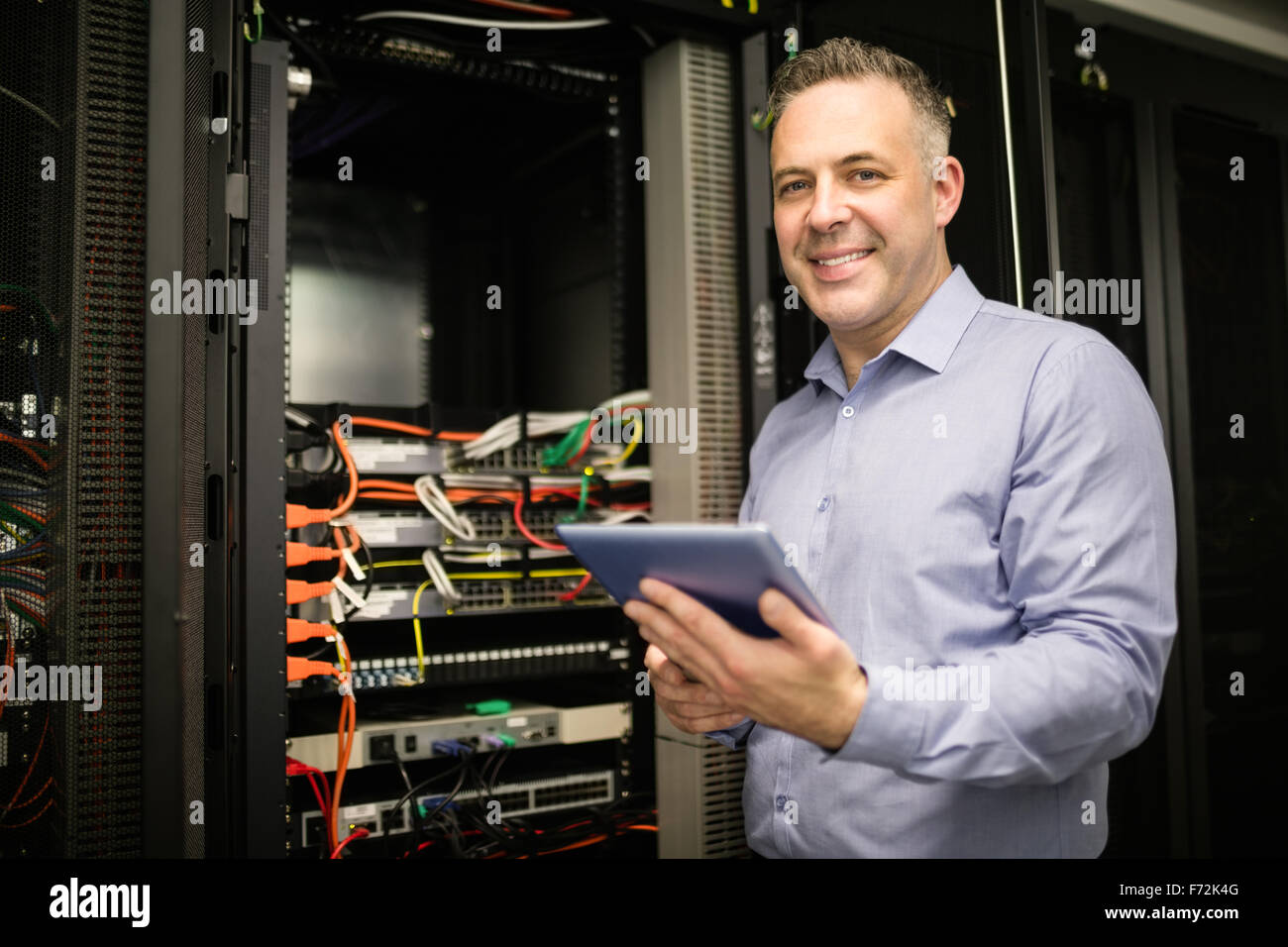 Technician using tablet analysing hi-res stock photography and images ...