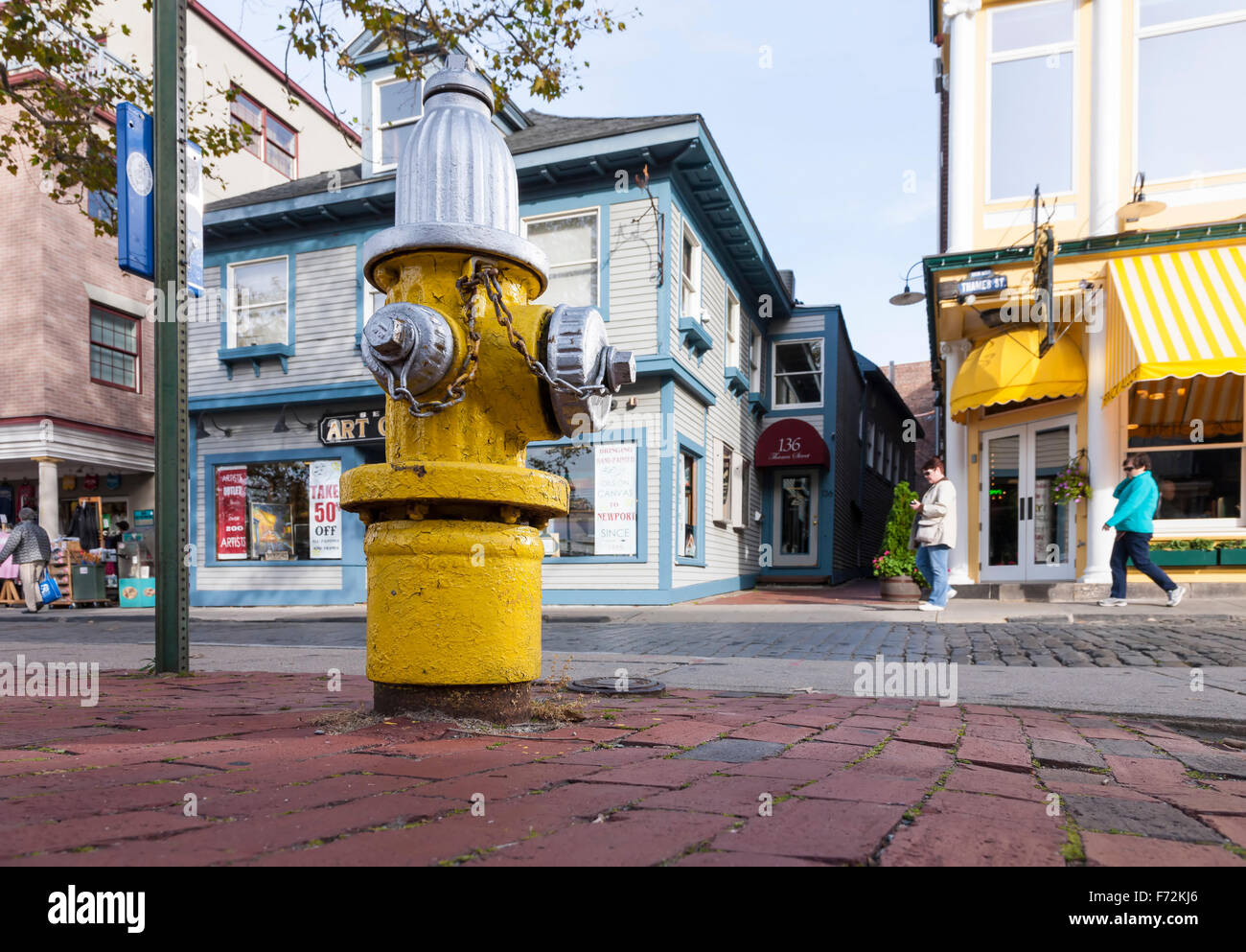 Yellow Fire hydrant standpipe on street, Newport, Rhode Island Stock ...