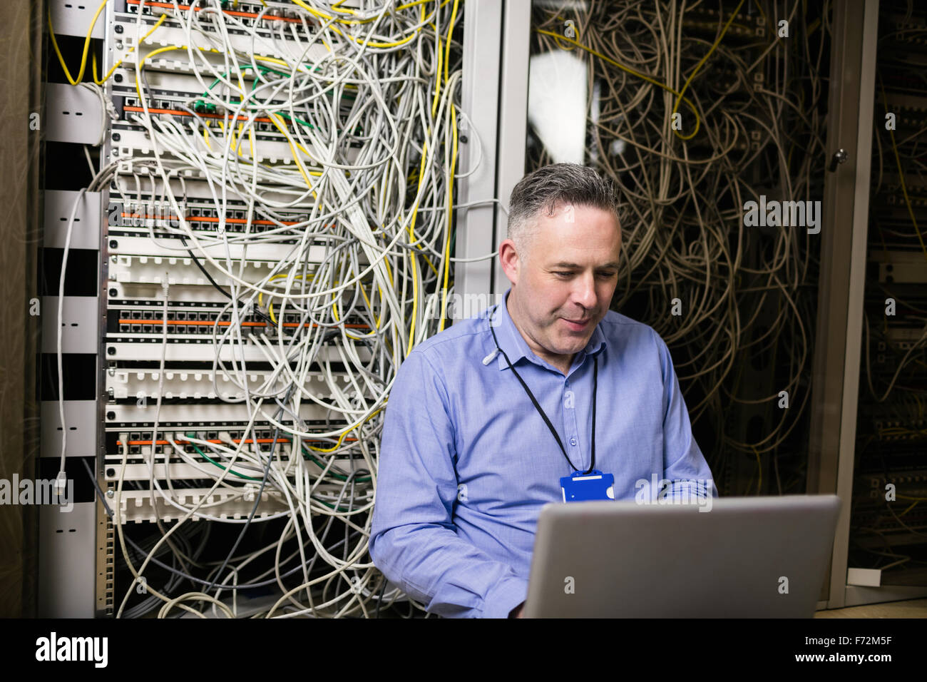 Technician using rack mounted hi-res stock photography and images - Alamy