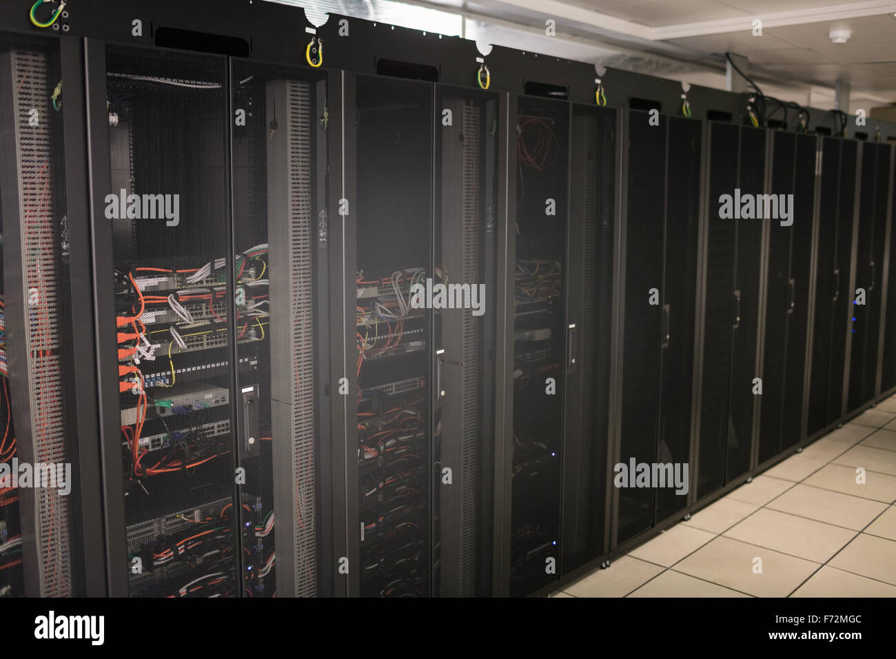 Servers in lockers Stock Photo - Alamy