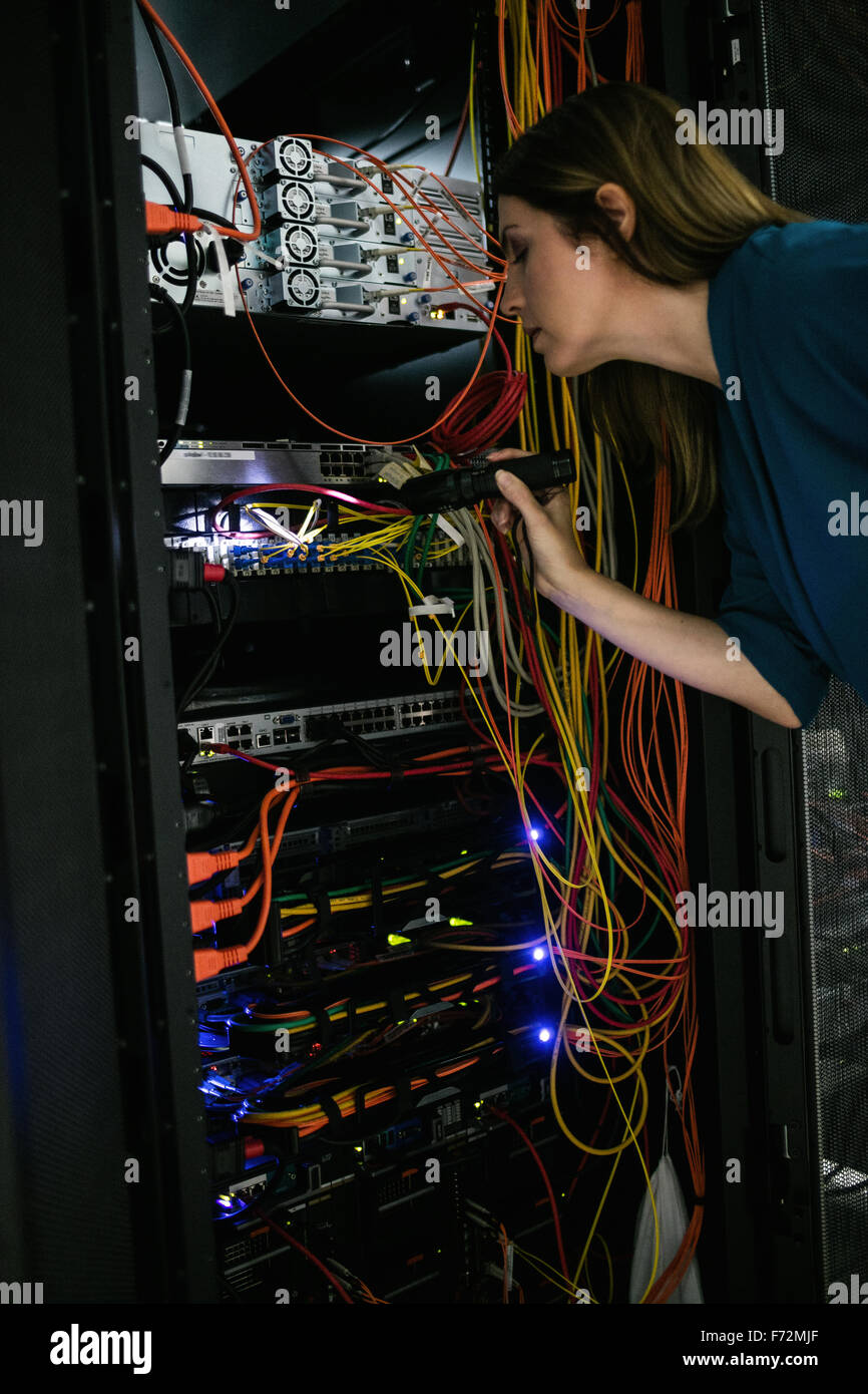 Woman shining torch hi-res stock photography and images - Alamy