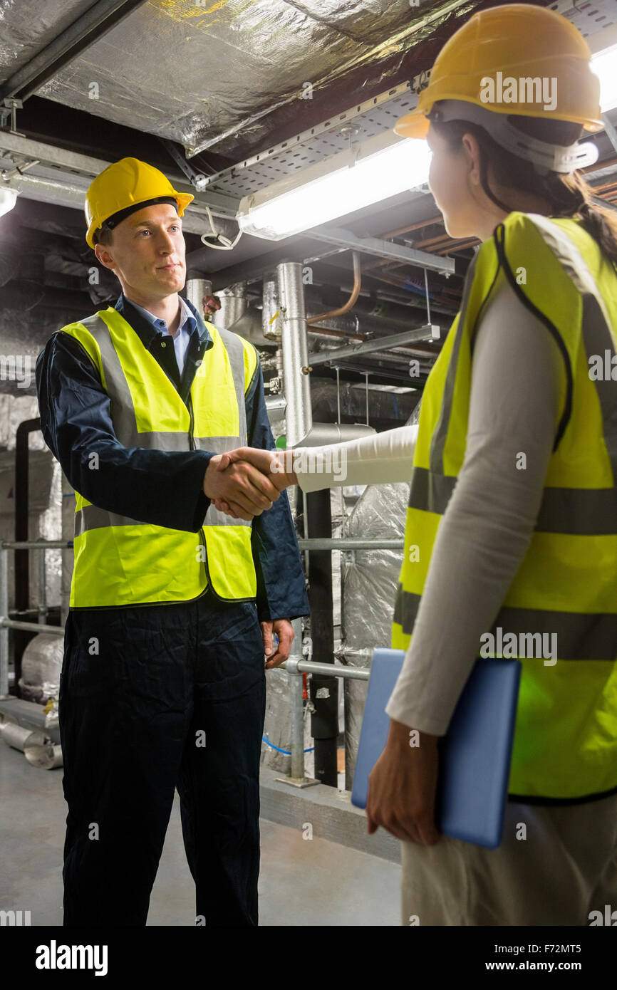 Engineers working in temperature control room Stock Photo - Alamy
