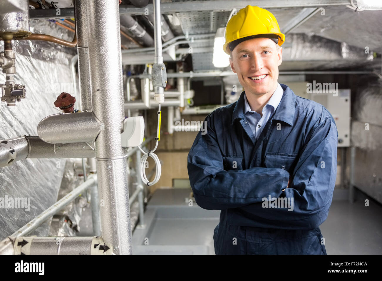 Engineer smiling at the camera Stock Photo - Alamy