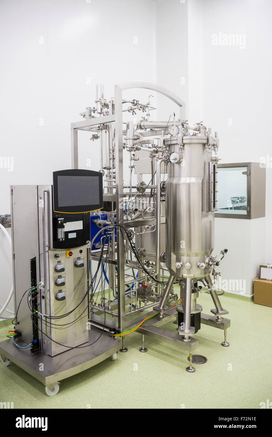 Large vat with taps and pumps Stock Photo - Alamy