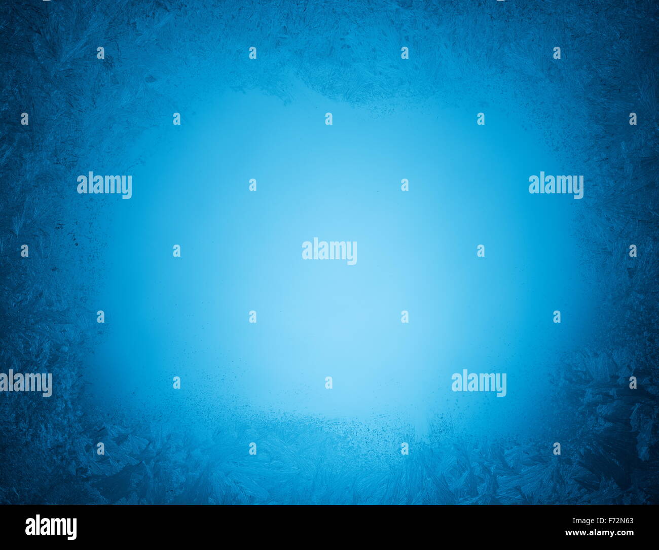 Frosty patterns on the edge of a frozen window Stock Photo - Alamy