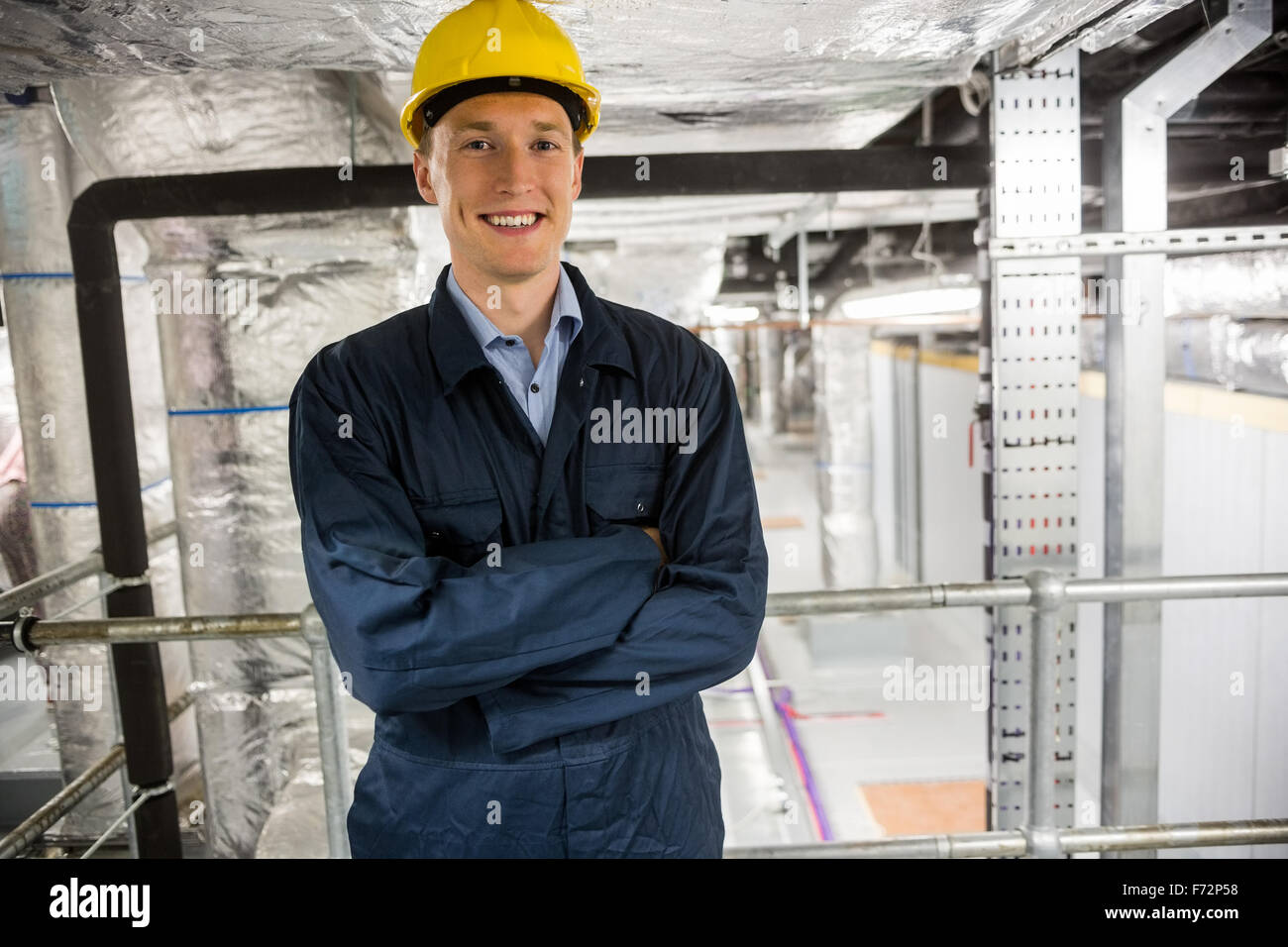 Engineer smiling at the camera Stock Photo - Alamy