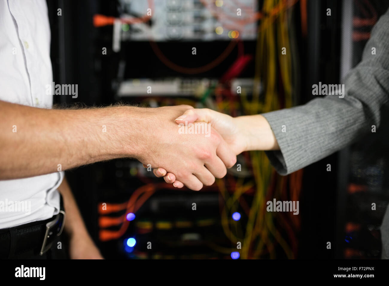 Team of technicians working together on servers Stock Photo - Alamy