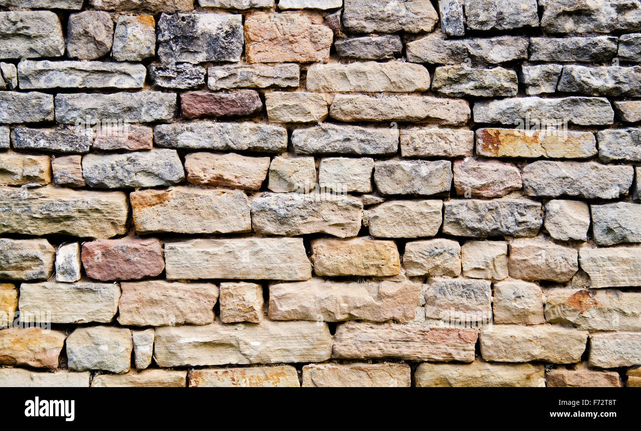 Stacked stone wall background horizontal Stock Photo - Alamy