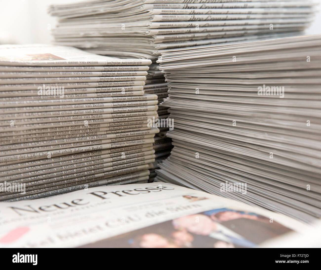 some german newspapers, stacked Stock Photo - Alamy