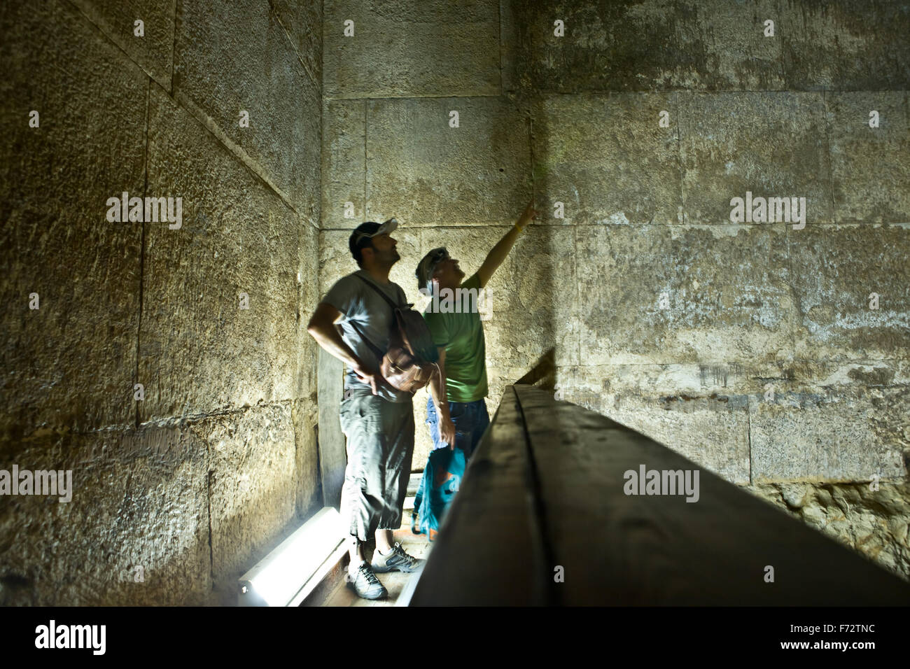 Visitors at Red Pyramid chamber or North Pyramid. The largest of the ...