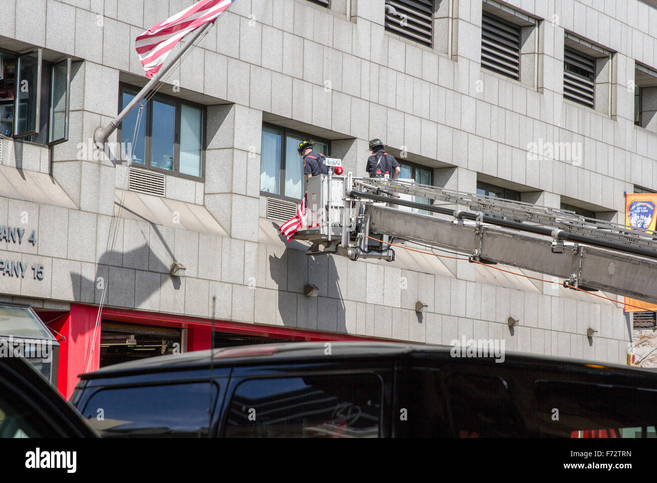 Firemen at work Stock Photo - Alamy