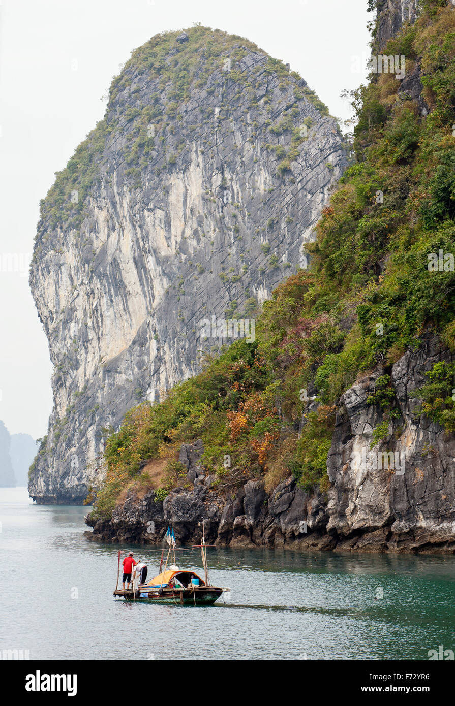 Halong bay and fishing boat hi-res stock photography and images - Alamy