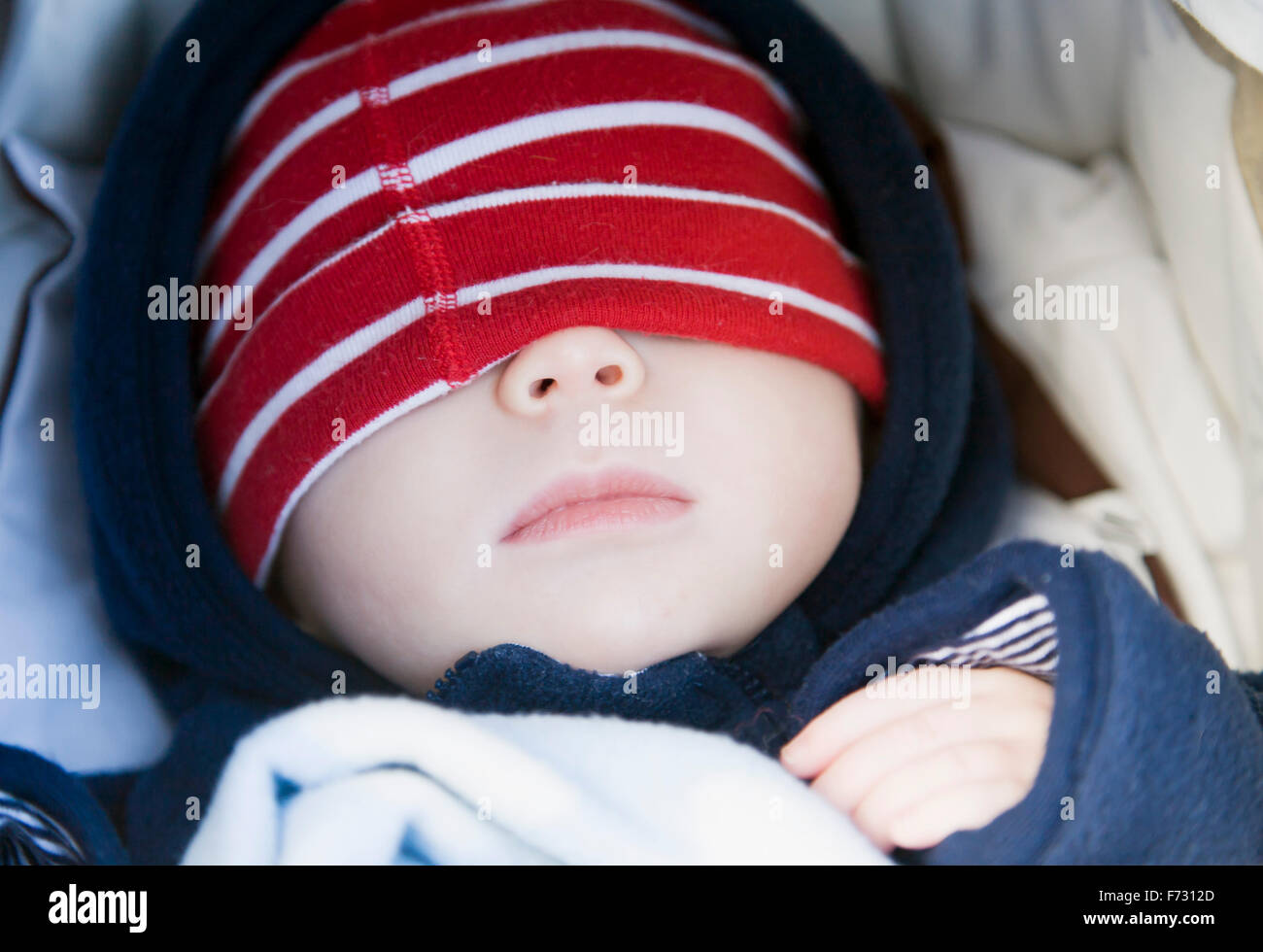 Infant taking a nap Stock Photo - Alamy