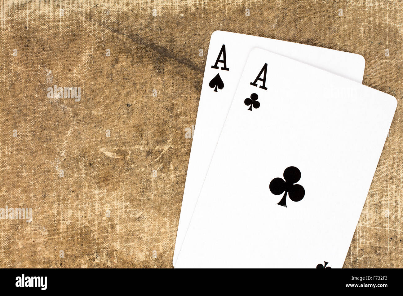 Pair of aces on canvas background with copy-space Stock Photo - Alamy