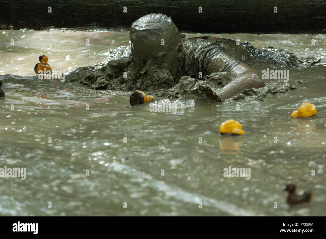 Women covered in mud hi-res stock photography and images - Alamy