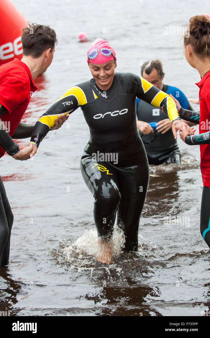 Cholmondeley, Cheshire, UK. 28th June 2015. Triathlete finishing the ...