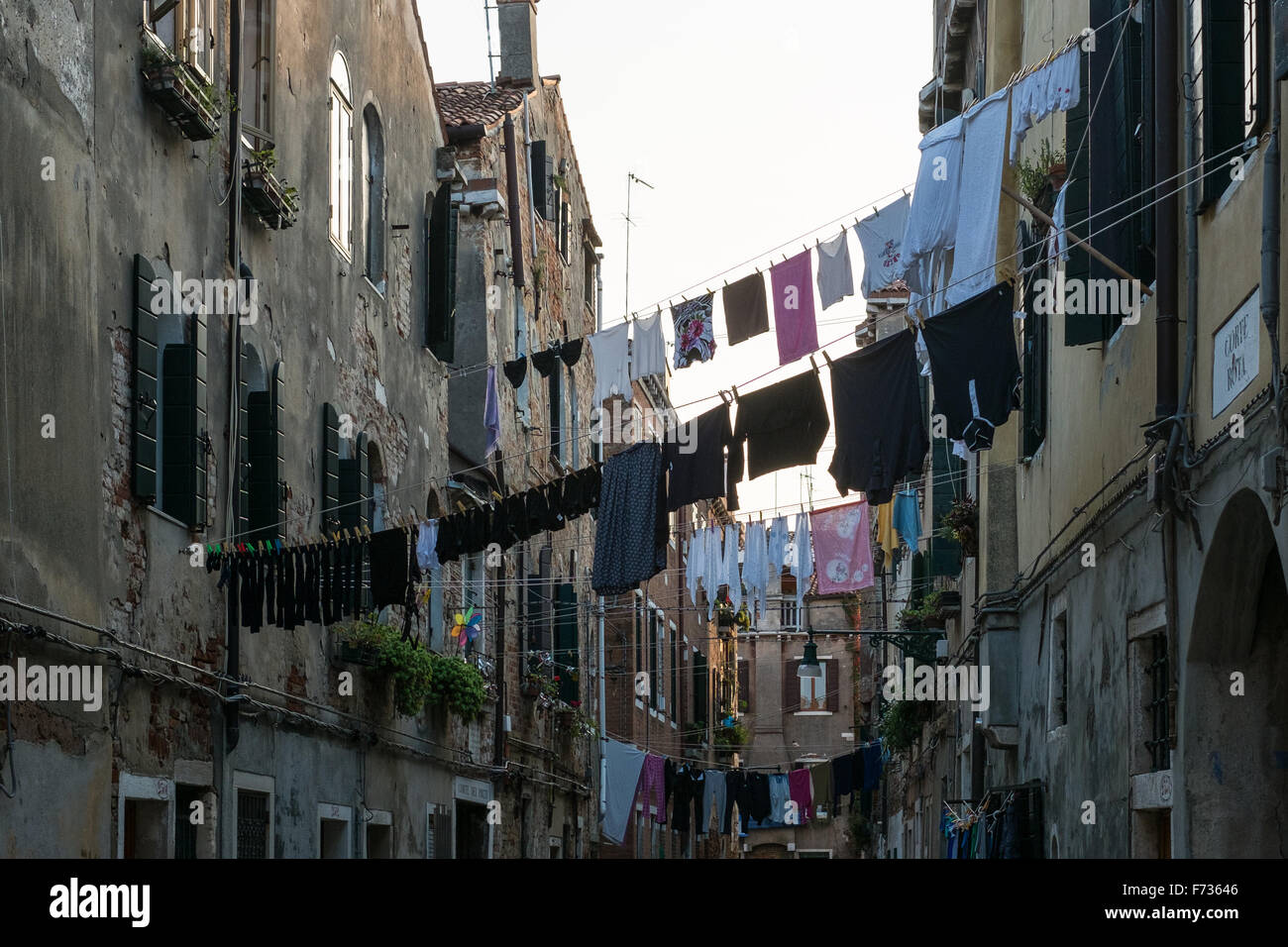 Laundry hanging from the washing lines of the Castello District, Venice ...
