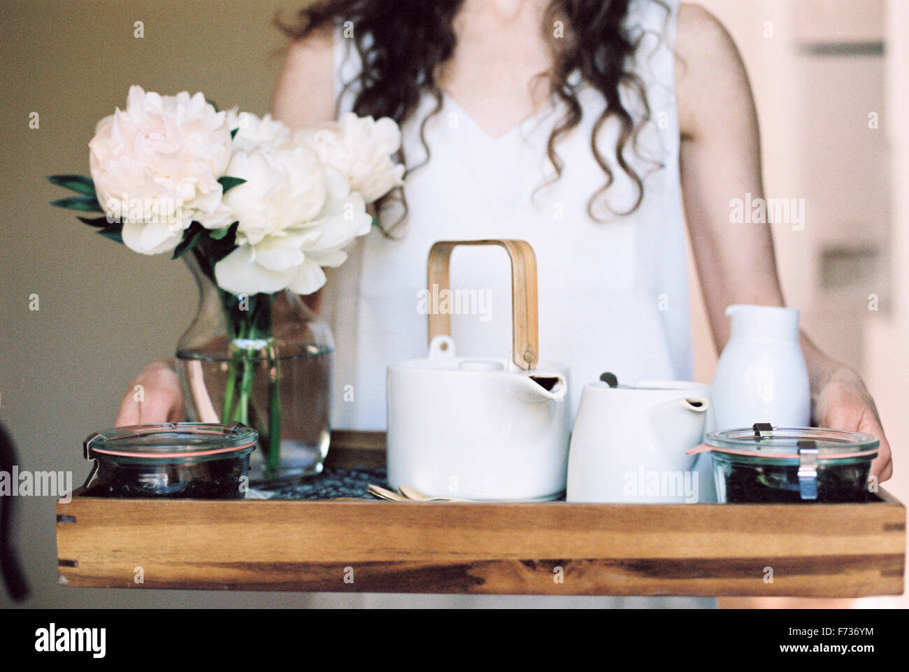 Carrying tea tray hi-res stock photography and images - Alamy