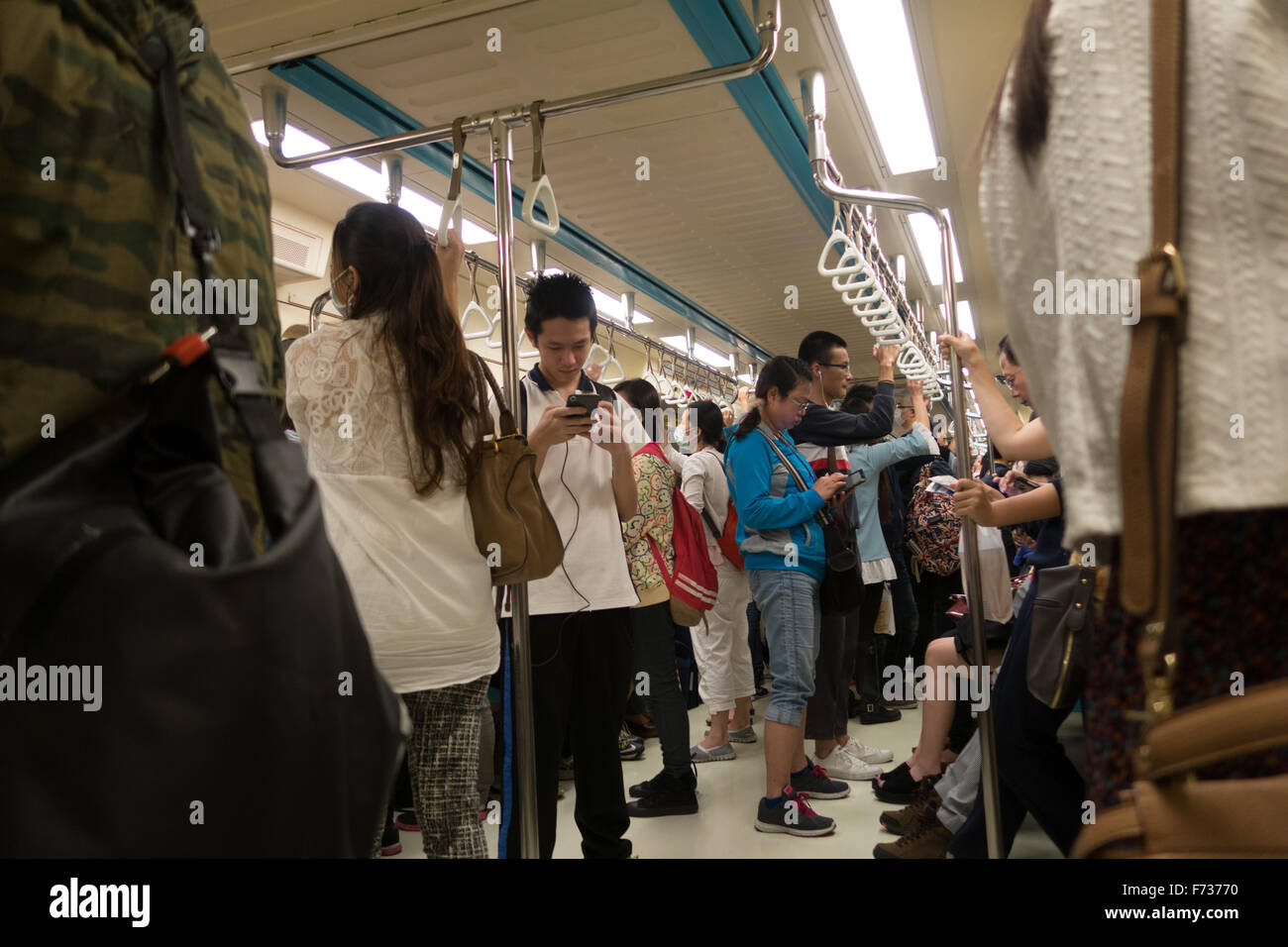 people inside taipei subway train Stock Photo - Alamy