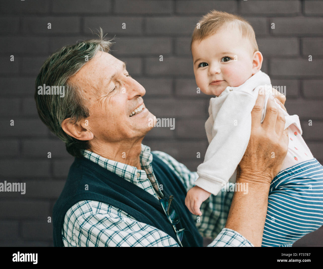 Grandfather and baby girl hi-res stock photography and images - Alamy