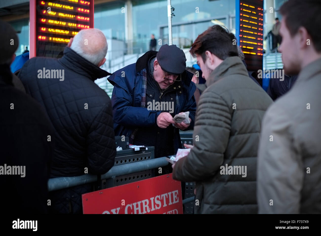 Ascot race day,21st November 2016. Bookies at the track side taking ...