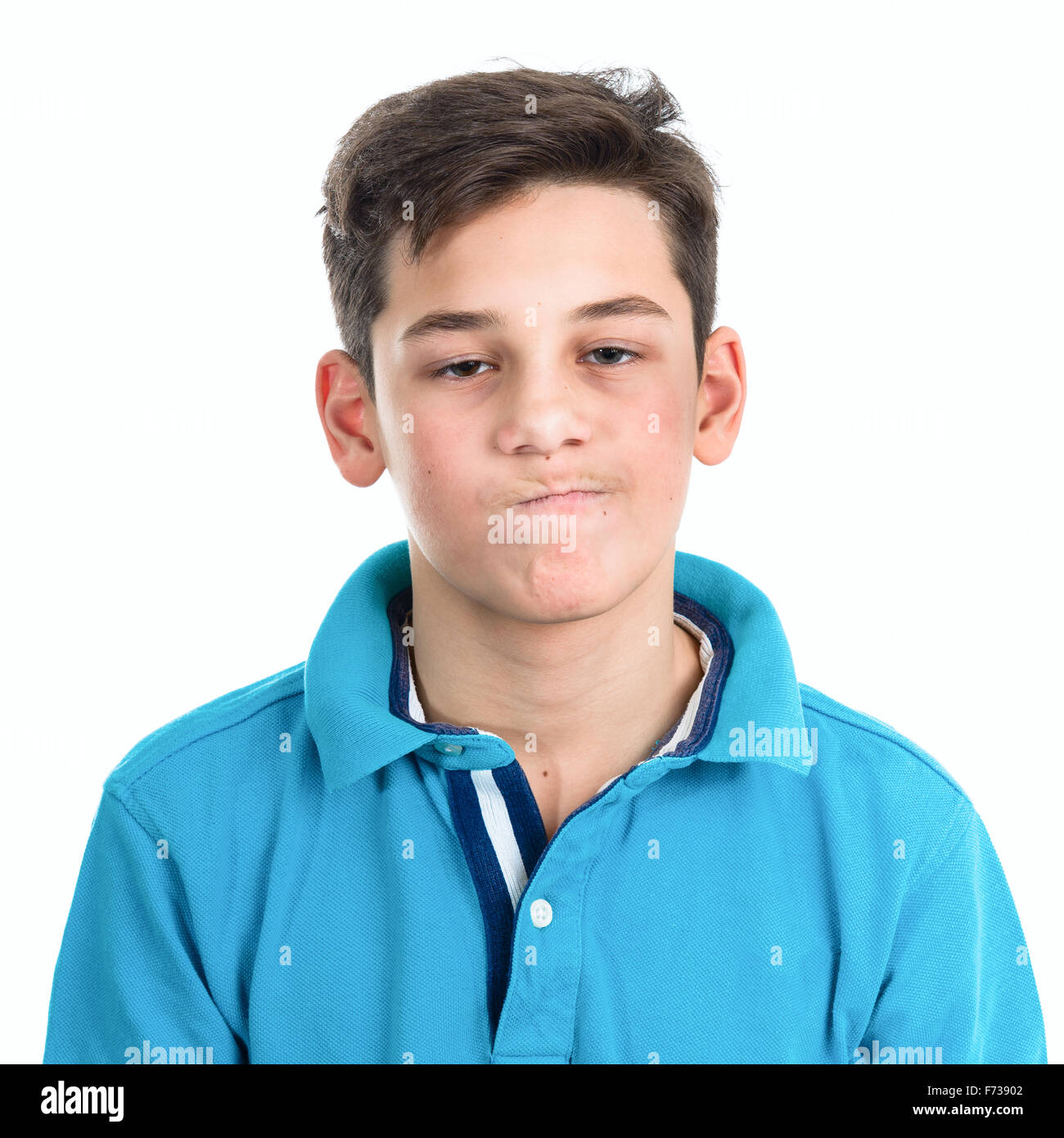Portrait of a tired teenager against a light background Stock Photo - Alamy