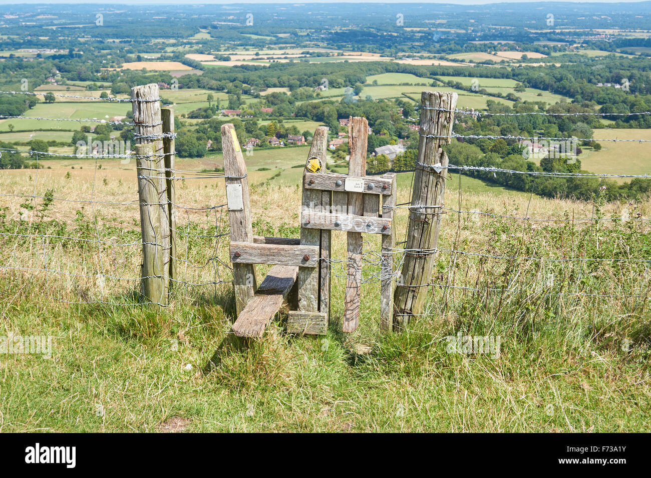 Stile and a view from Ditchling Beacon The South Downs National Park ...