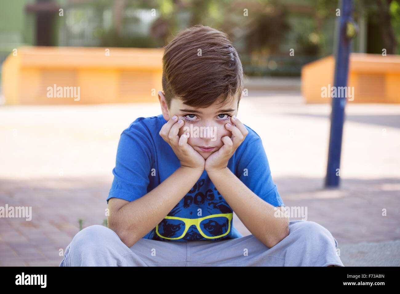 Cute upset boy pouting in the park on a sunny day Stock Photo - Alamy Cute upset boy pouting in the park on a sunny day Stock Photo - Alamy
