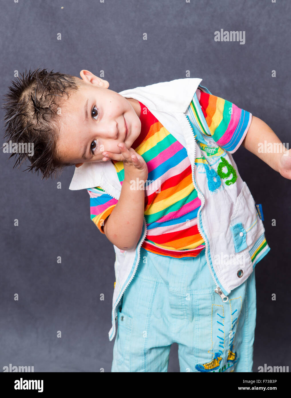 Small boy posing hi-res stock photography and images - Alamy