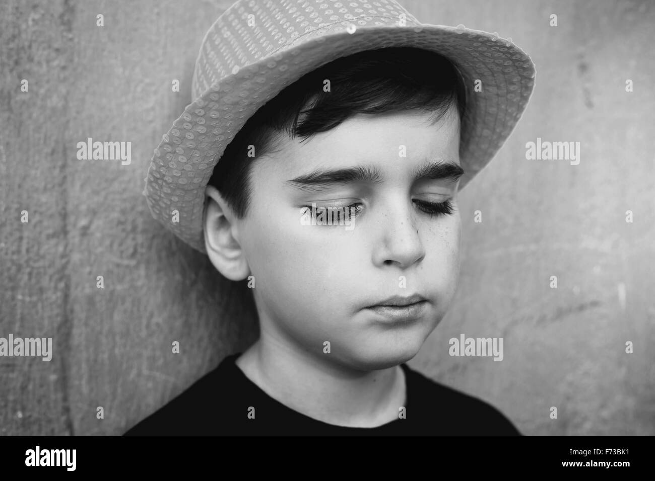 Cute upset boy pouting in the park on a sunny day Stock Photo - Alamy Cute upset boy pouting in the park on a sunny day Stock Photo - Alamy