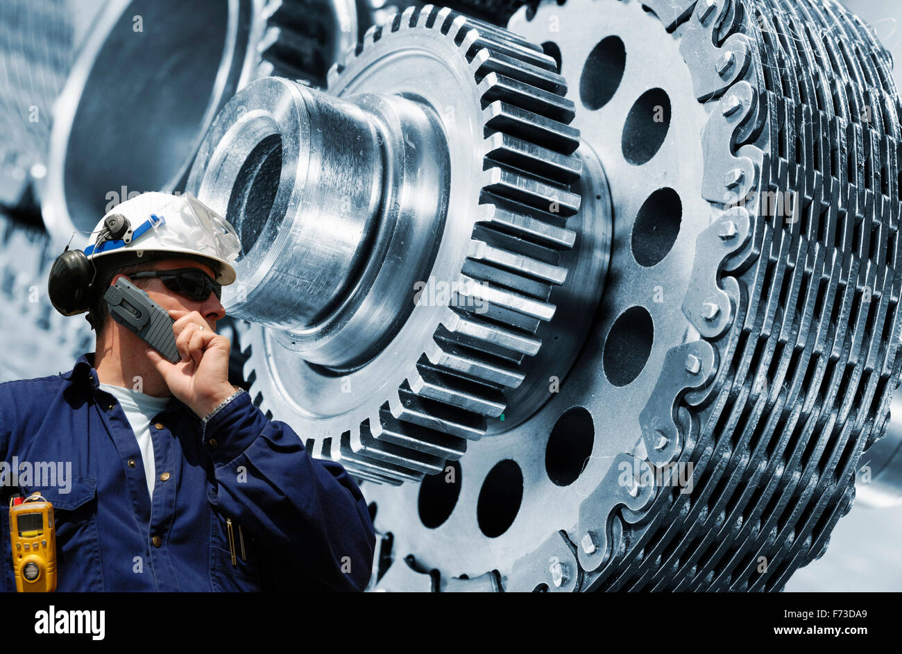 engineer, worker with giant cogwheels machinery Stock Photo - Alamy