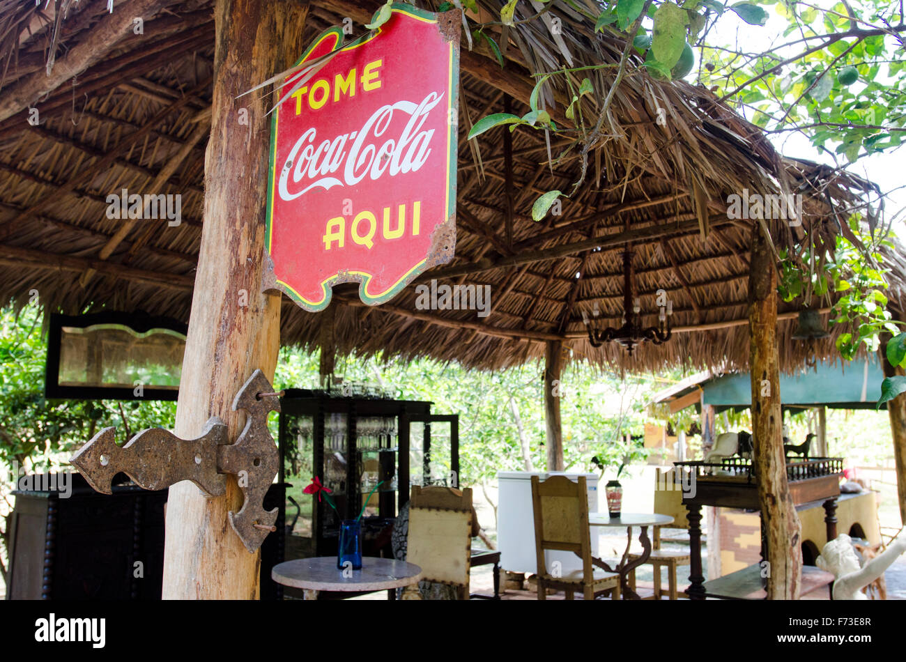 A restaurant with an old Coca-Cola service sign in Trinidad, Cuba Stock ...
