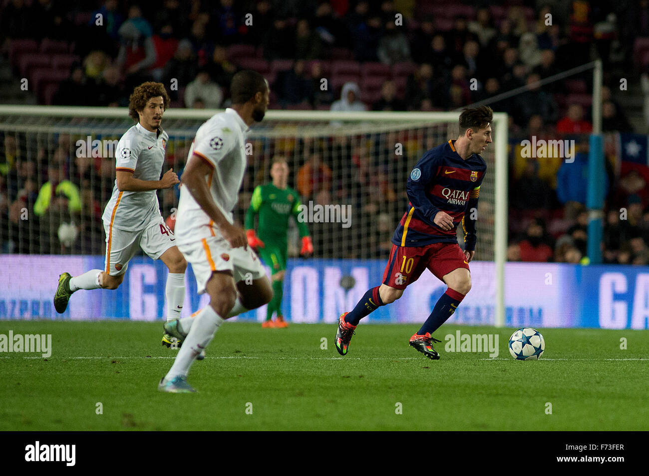 Barcelona, Spain. 24th Nov, 2015. Barcelona's Lionel Messi (1st R) vies ...