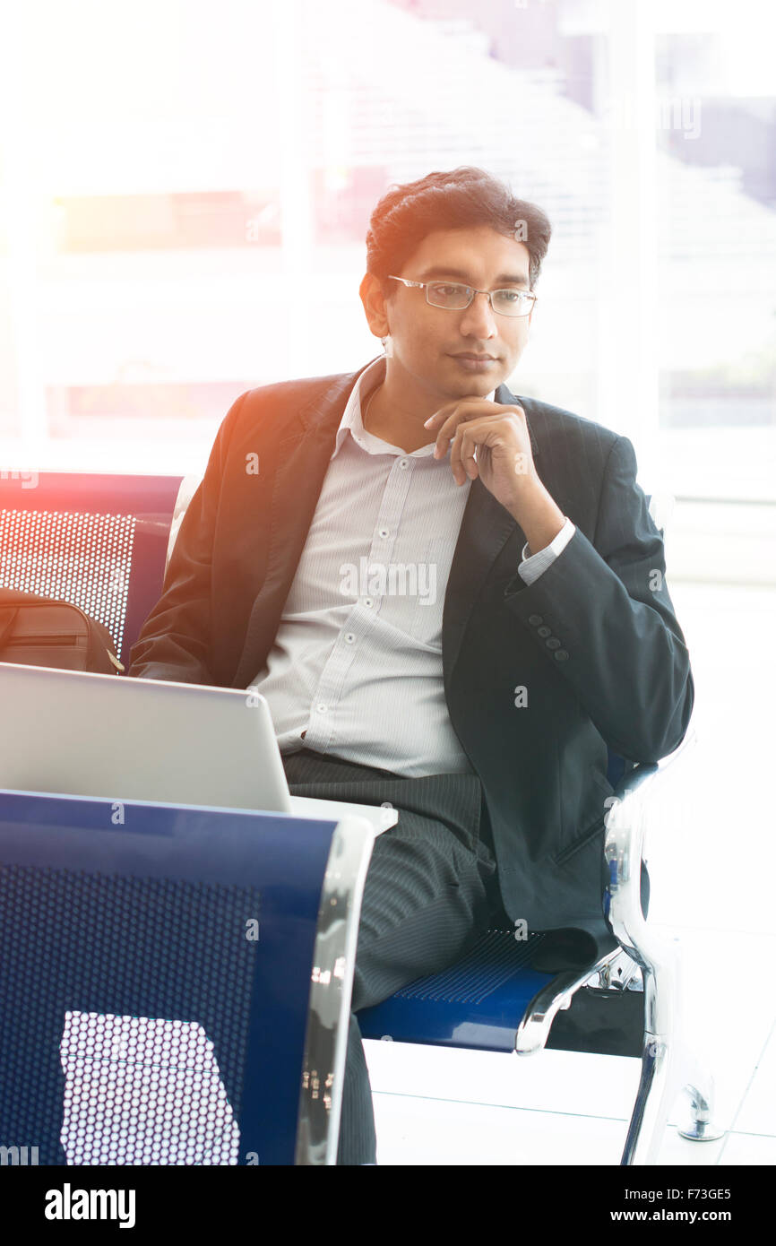 Asian Indian businessman using laptop computer Stock Photo - Alamy