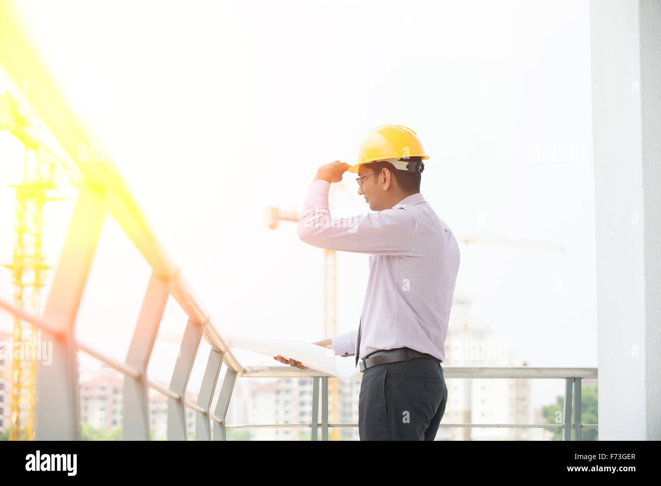 indian engineer on construction background Stock Photo - Alamy