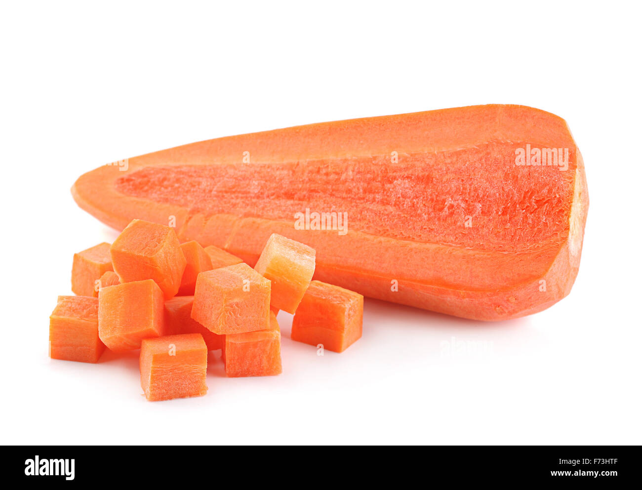 Carrot vegetable cube isolated on white background Stock Photo - Alamy