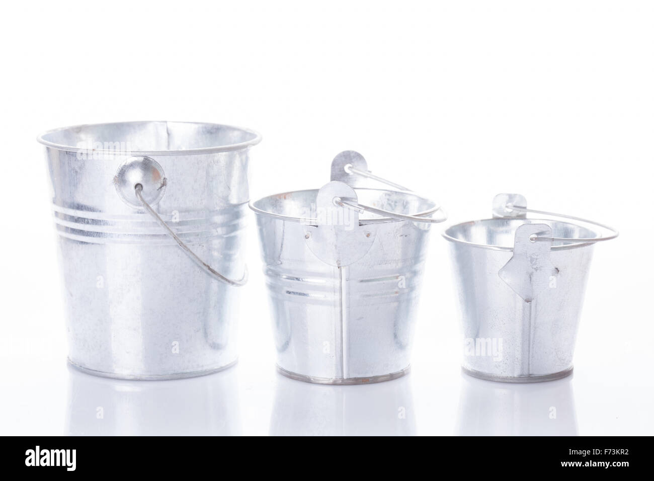 Three metal buckets Stock Photo - Alamy
