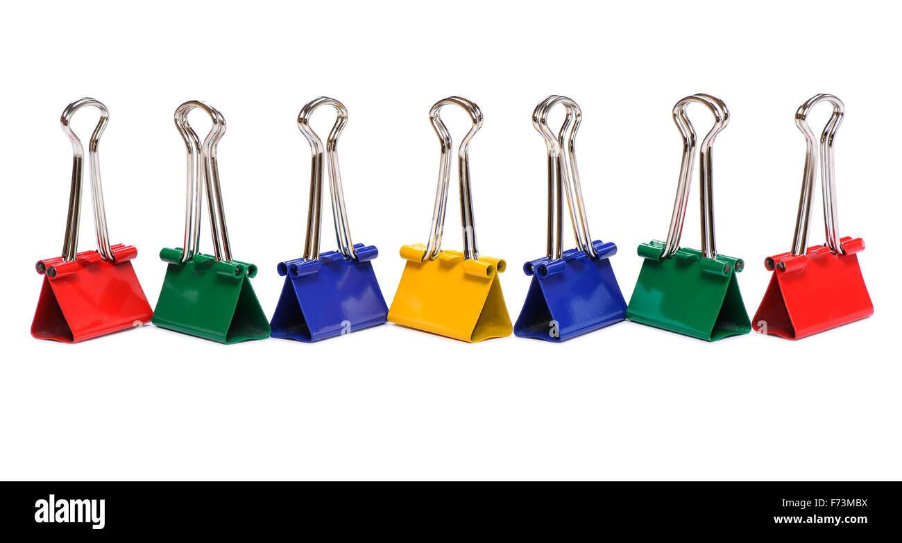 Color binder clips on white background Stock Photo - Alamy