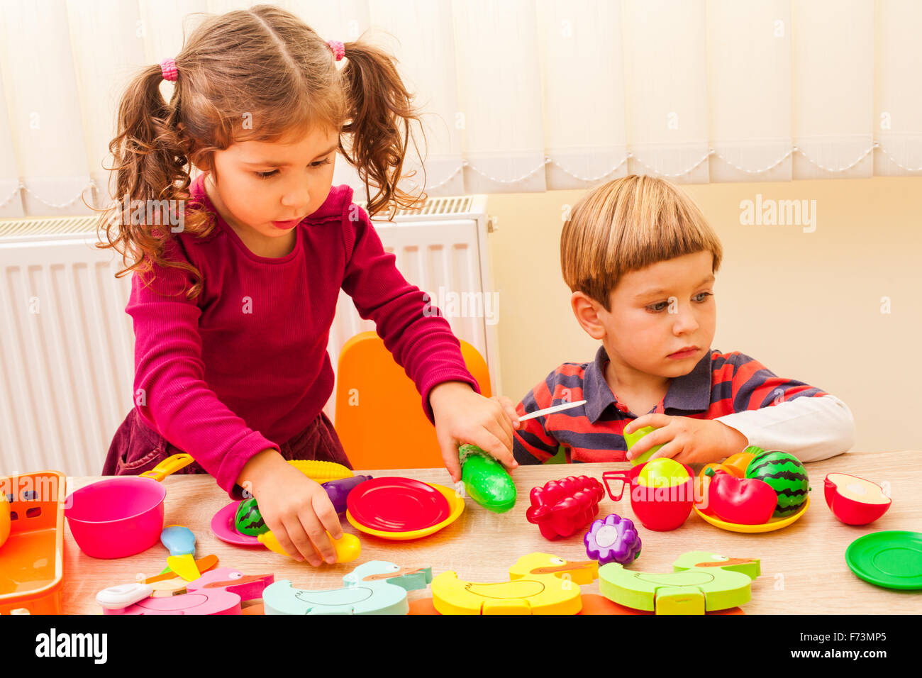 Children playing cooks Stock Photo - Alamy