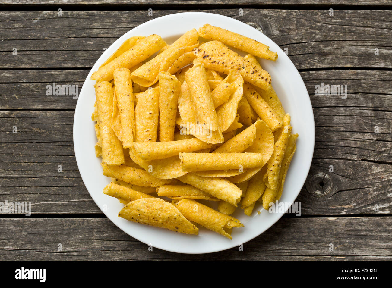 rolled nacho chips on table Stock Photo - Alamy
